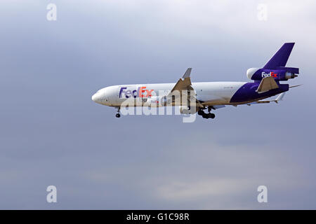 Commercial FedEx cargo jumbo jet airplane landing at Ontario ...