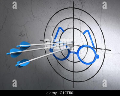 Science concept: arrows in Glasses target on wall background Stock ...