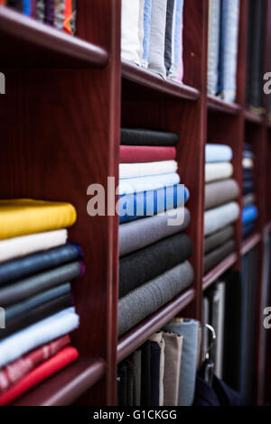 Many types of fine cloth at a bespoke tailor shop Stock Photo - Alamy