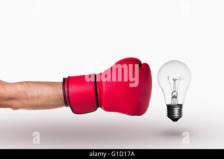 Boxing glove and a lamp in a same frame on a black background Stock ...