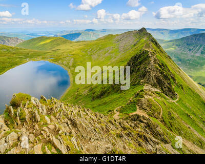 Helvellyn mountain peak and Red Tarn corrie lake, Lake District ...