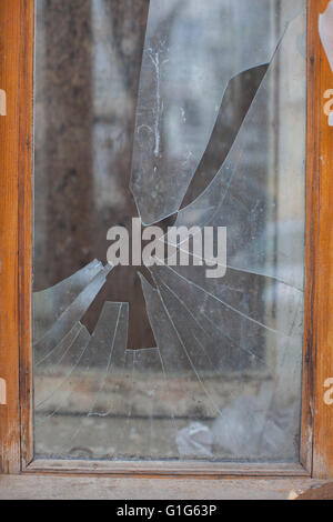 Damage from impact stone or bullets Stock Photo - Alamy