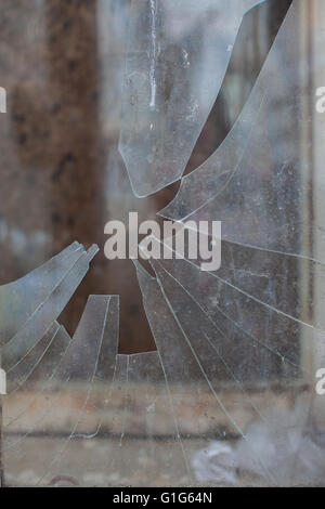 Damage from impact stone or bullets Stock Photo - Alamy