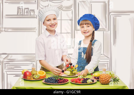 Children making fruit snacks Stock Photo - Alamy