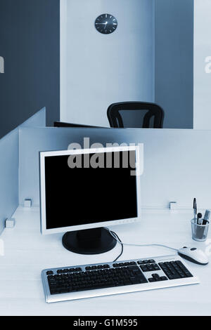 computers behind the glass in a modern office Stock Photo - Alamy