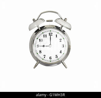 Analog alarm clock showing nine o'clock, 9pm or 9 am isolated on white ...