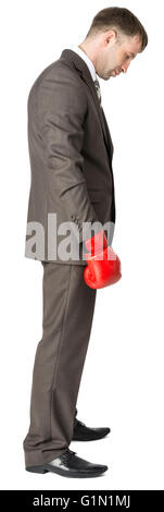 Sad businessman in boxing gloves Stock Photo - Alamy