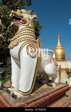 Golden chinthe (half lion, half dragon) statue sculpture at Shwedagon ...
