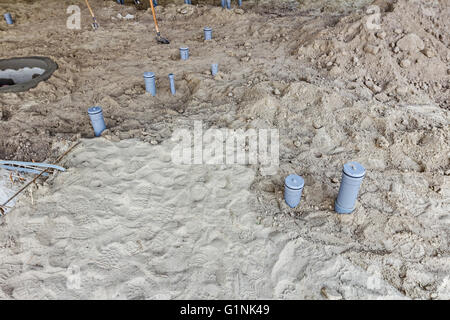 Set of waste pipes are assembled and lined up on building site Stock ...