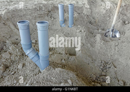 Set of waste pipes are assembled and lined up on building site Stock ...