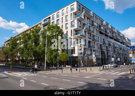 New modern block of flats in green area at winter. residential ...