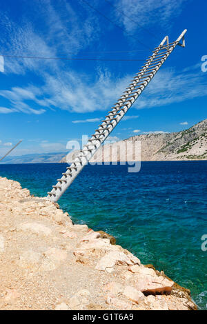 Ladder into the mediterranean sea on a small bay on mallorca island ...