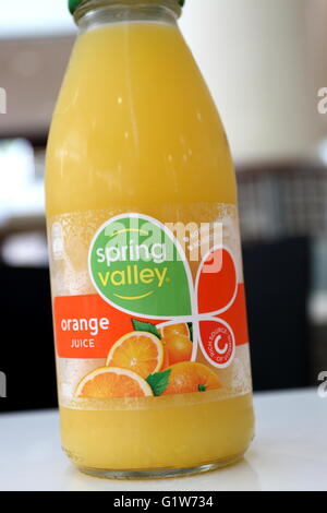 Orange juice produced in an organic photographed on white background ...