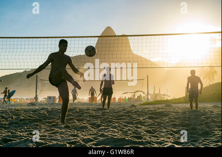 Sports futevolei or footvolley in Brazil This is the beach volleyball ...