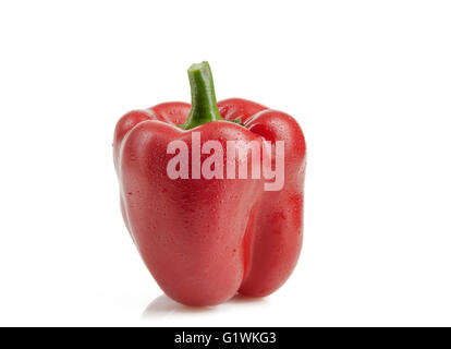 one whole red bell pepper and one cut in half in cross section ...