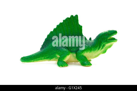 side view green dimetrodon toy on a white background Stock Photo - Alamy