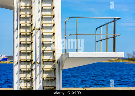 Concrete diving boards at a public outdoor swimming pool Stock Photo ...