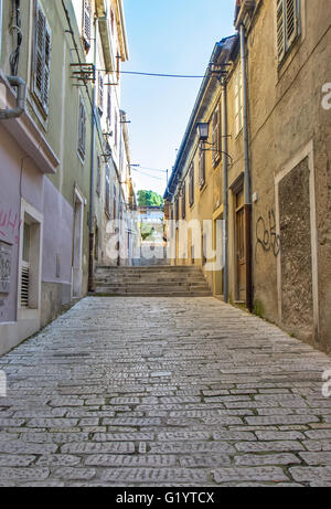 Narrow street in Pula. Old Vintage Buildings Near Forum Square - Pula ...