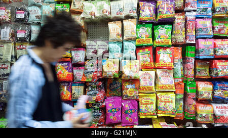 Packets of sweets in a UK supermarket Stock Photo - Alamy