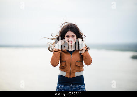 young casual happy man with a phone, isolated Stock Photo - Alamy