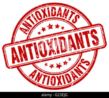 antioxidants red grunge vintage stamp isolated on white background ...