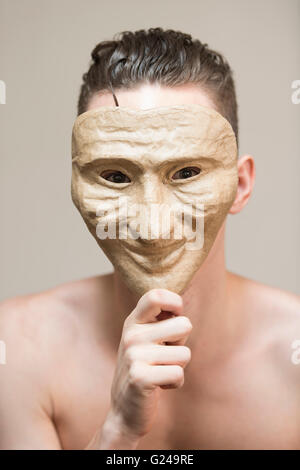 Anonymous caucasian man hiding his identity . Studio shot Stock Photo ...