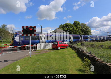 Scotrail train passing level crossing Blackford Scotland May 2016 Stock ...