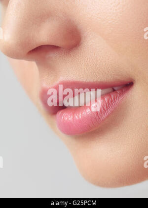 Close up of a young womans mouth, slightly open Stock Photo - Alamy