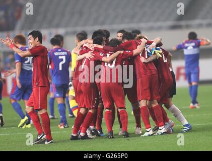 Japan's players celebrate their second goal against Saudi Arabia during ...
