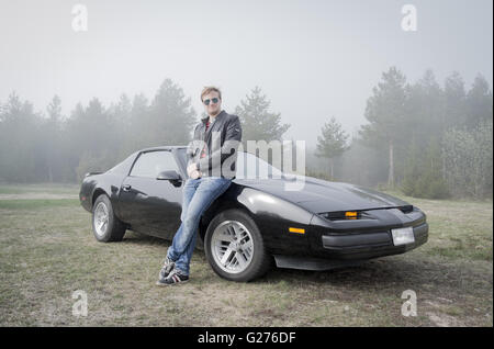 Proud owner with his sports car, Pontiac Firebird Stock Photo - Alamy