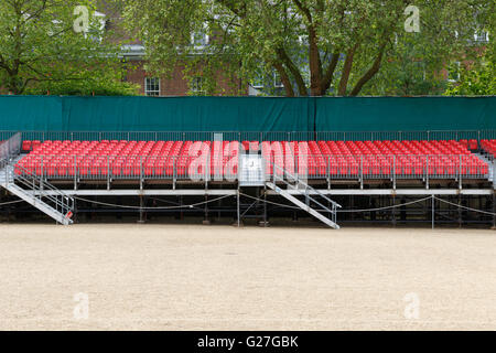 Temporary raked red spectator seating for an outdoor event Stock Photo ...
