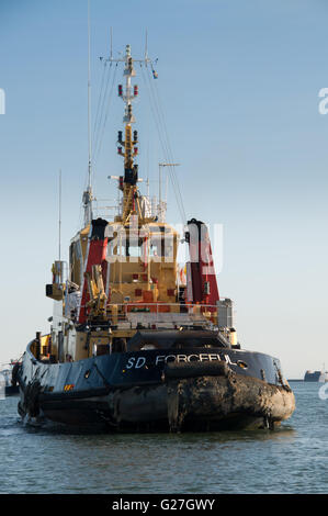 tug boat with yellow funnel Stock Photo - Alamy