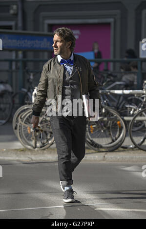 German actor Falk Willy Wild out and about with a book in Mitte ...