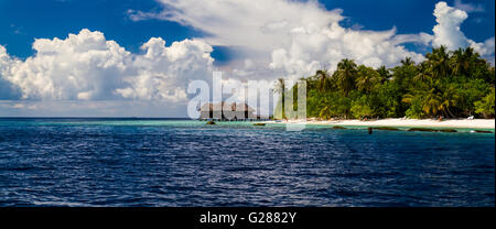 Vibrant tropical ocean panorama with palm coastline and island harbor ...