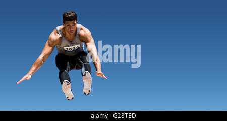 Composite image of front view of sportsman practising shot put Stock ...