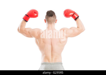Boxer flexing biceps and wearing red boxing gloves on white background ...