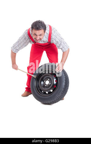 Changing a tire Stock Photo - Alamy