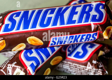 Three snickers bars Stock Photo - Alamy