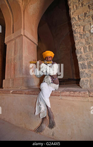 Indian man playing the flute, India Stock Photo - Alamy