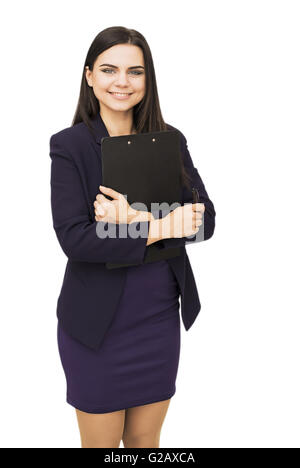 Happy young business woman pointing at copy space Stock Photo - Alamy