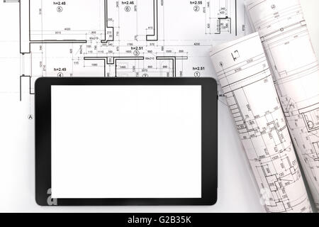 architectural drawings and blueprint rolls. architects work table Stock ...