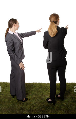 Businesswoman woman pointing from behind Stock Photo - Alamy