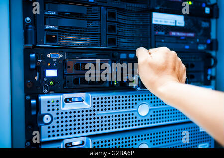 People fix server network in data room Stock Photo - Alamy