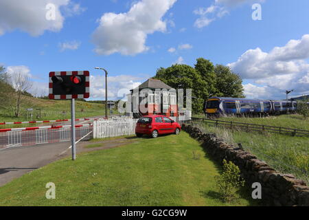 Scotrail train passing level crossing Blackford Scotland May 2016 Stock ...