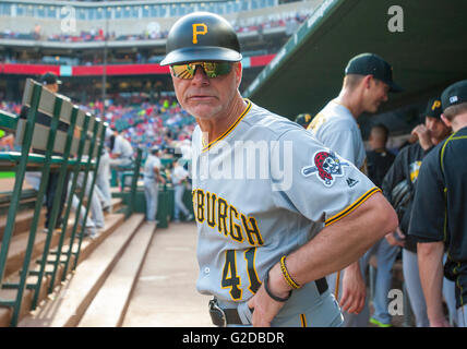 Pittsburgh Pirates third base coach Nick Leyva walks to his position ...
