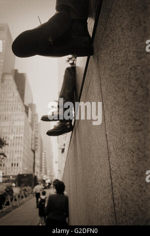 Feet Dangling From Above city from rooftop Stock Photo - Alamy
