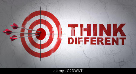 Learning concept: target and Think Different on wall background Stock ...
