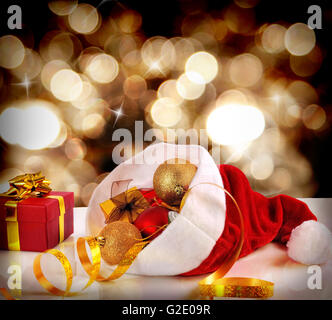 Composition with Santa hat and beautiful Christmas decorations on table ...