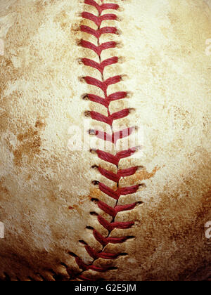 Worn old baseball with detail of stitching on black background Stock ...