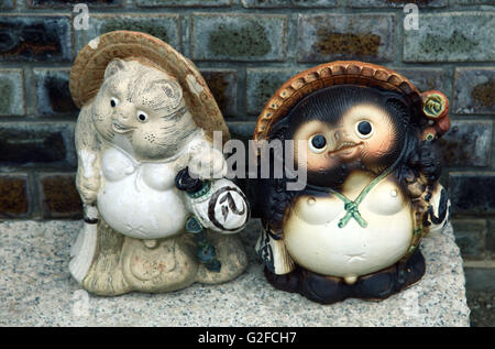 Tanuki Cute Japanese raccoon dog statues at Kameoka station in Japan ...